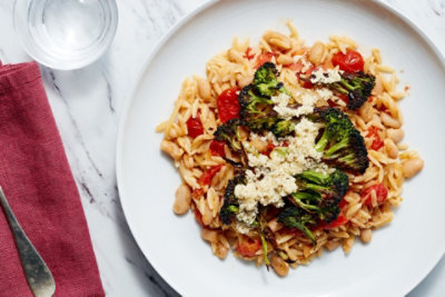 Charred Broccoli with Orzo, Tomato Sugo, and Parmesan Vinaigrette | Safeway